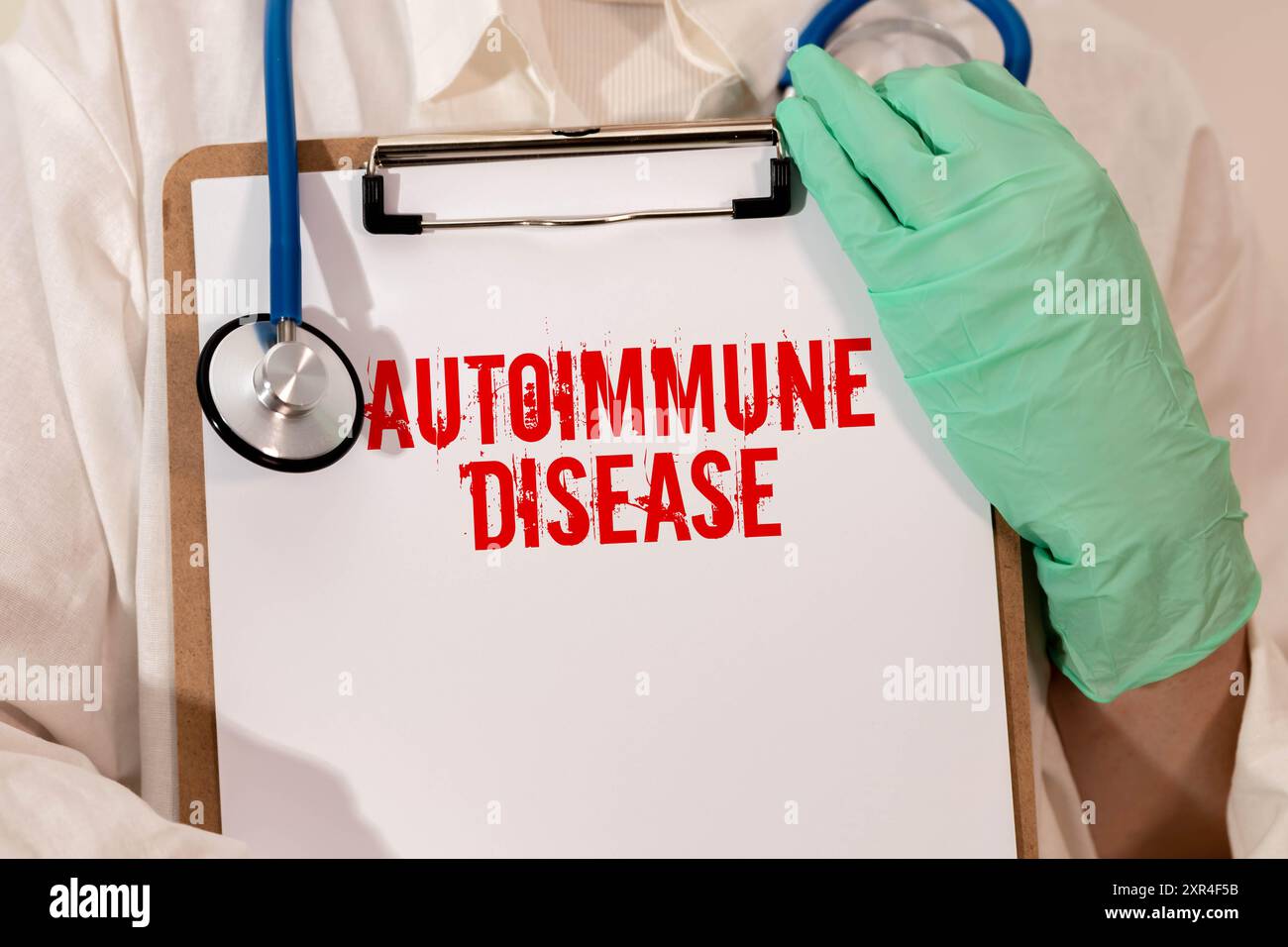 AUTOIMMUNE DISEASE. TEXT ON A WOODEN BAR on a blue background. Medical ...