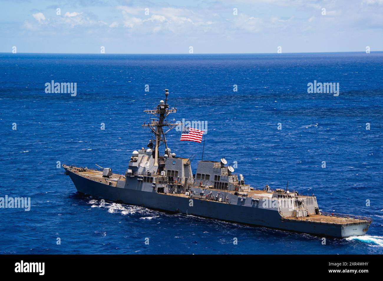 Arleigh Burke-class guided-missile destroyer USS Kidd (DDG 100) sails ...