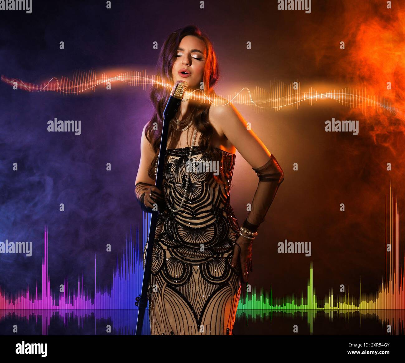 Beautiful woman with microphone singing in color lights. Audio ...