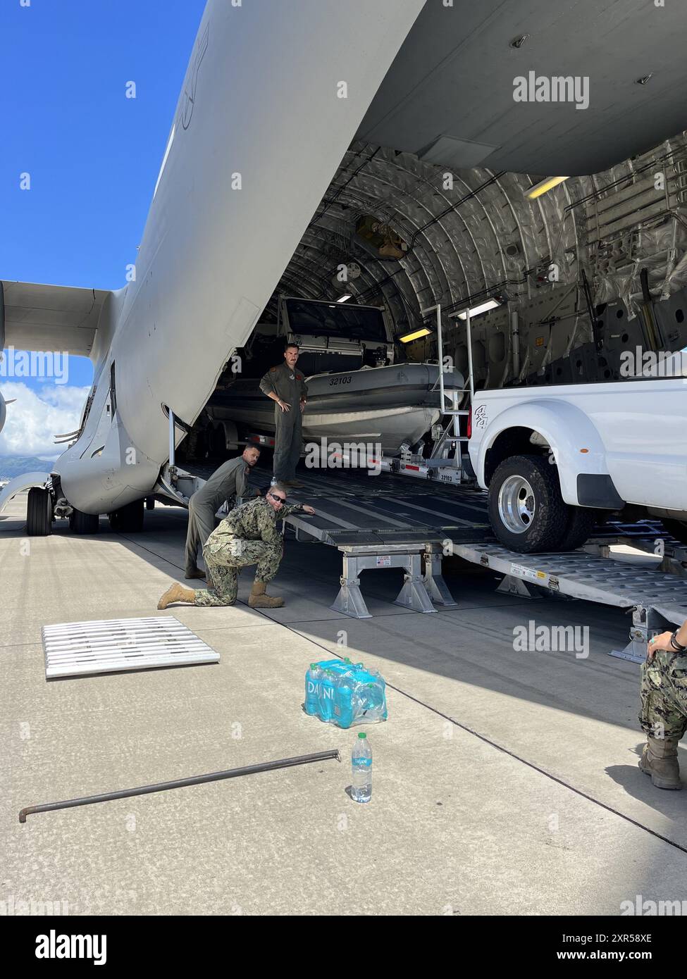 Members of Port Security Unit 311 coordinated with the 535th Airlift ...