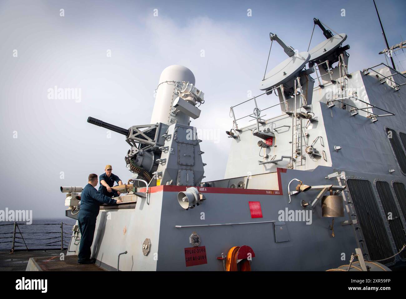 Fire Controlman 2nd Class William Haas, left, a native of North Olmsted ...