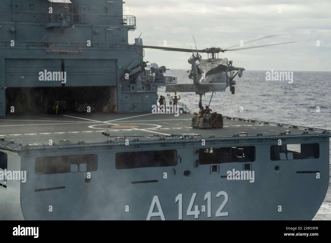 An MH-60S Sea Hawk, assigned to the “Black Knights” of Helicopter Sea ...
