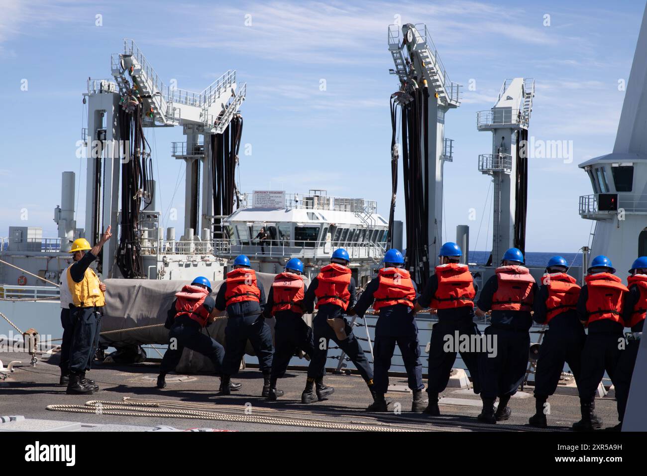240729-N-DK042-1062 (July 29, 2024) Sailors heave the messenger line ...