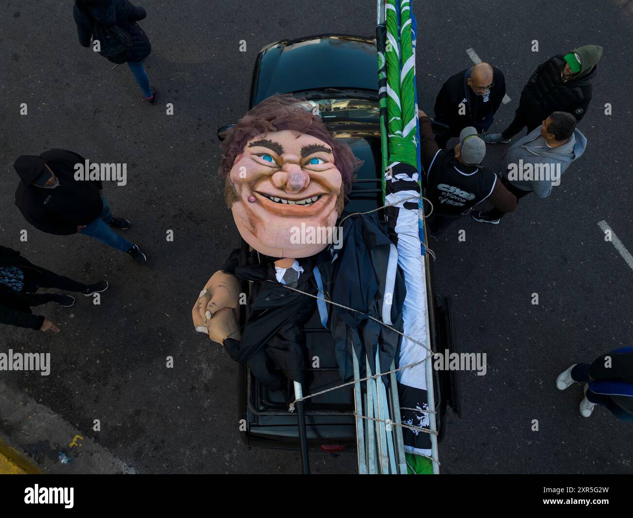 A large puppet in the likeness of Argentine President Javier Milei lays ...