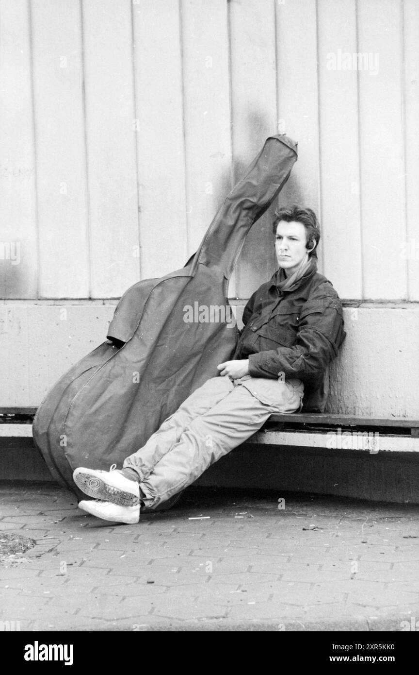 Waiting boy with bass on bus, Music, People, 24-03-1986, Whizgle Dutch ...