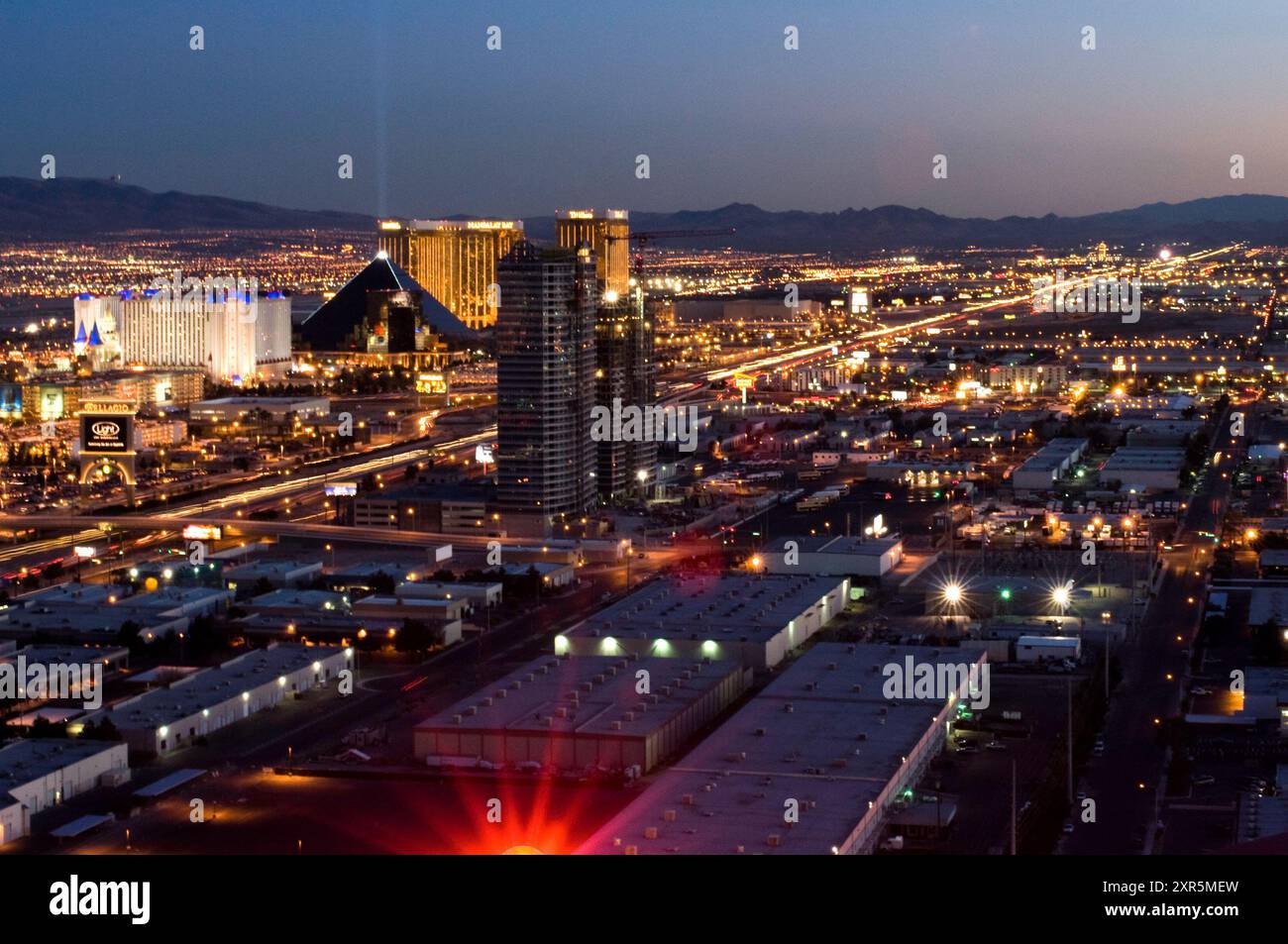 Dusk sets on the Las Vegas desert and and the lights go up on the ...