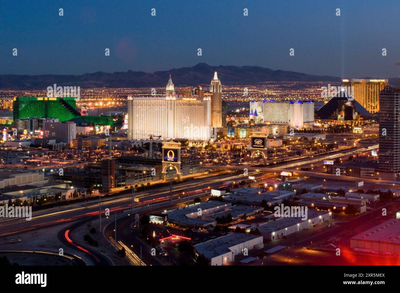 Dusk sets on the Las Vegas desert and and the lights go up on along the ...