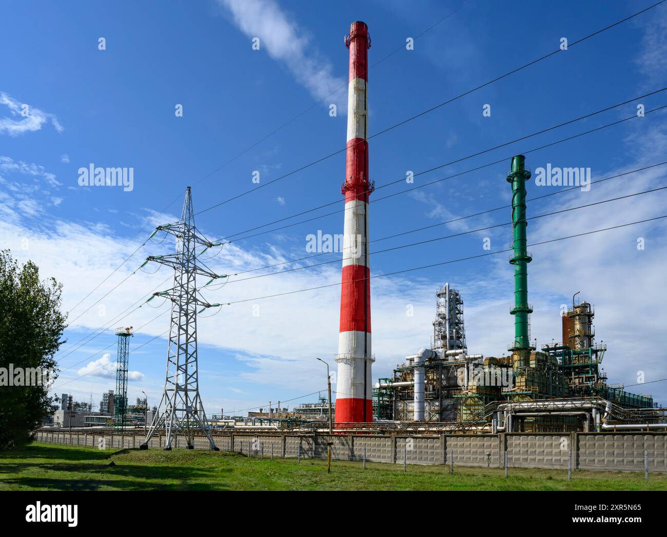 Colorful tall pipes, gas pipelines, tanks, ladders and other equipment ...