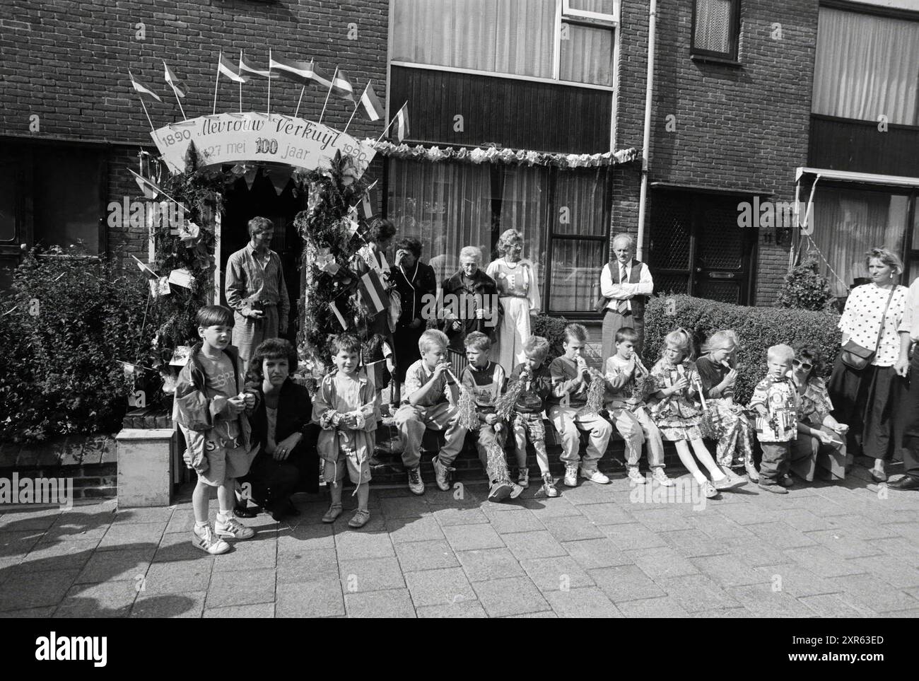 Mrs. Verkuijl 100 years with barrel organ Rebecca in the street, 27-05 ...