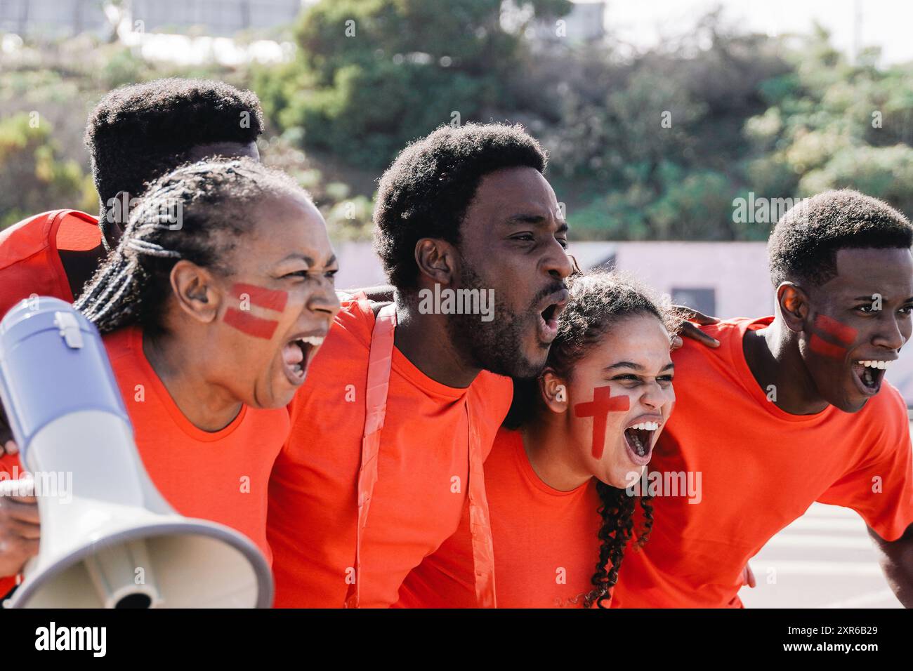 Soccer, African sport football fans support their team in stadium crowd ...