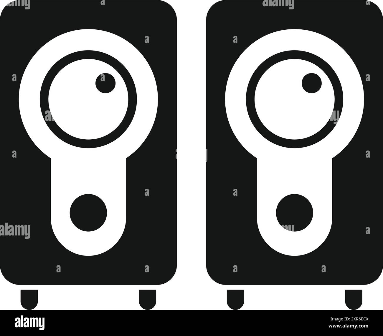 Two professional studio monitor speakers standing on a flat surface ...