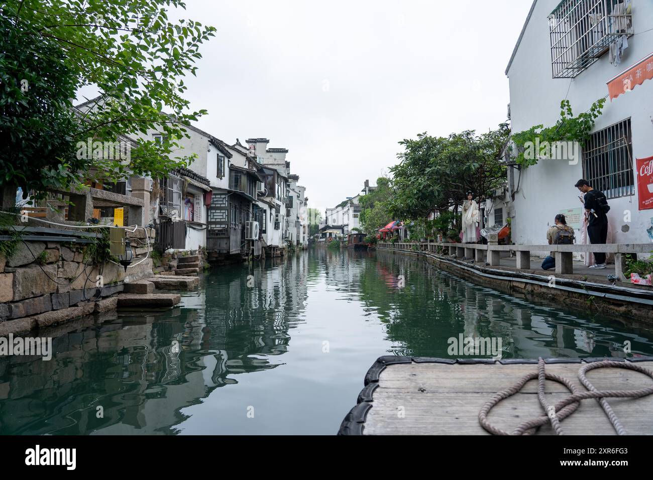 Suzhou, China - June 11, 2024 : A canal runs through a Suzhou ...
