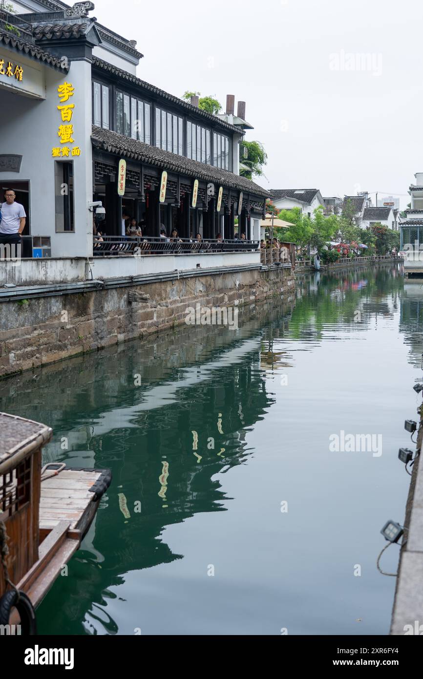 Suzhou, China - June 11, 2024 : A tranquil canal reflects the ...