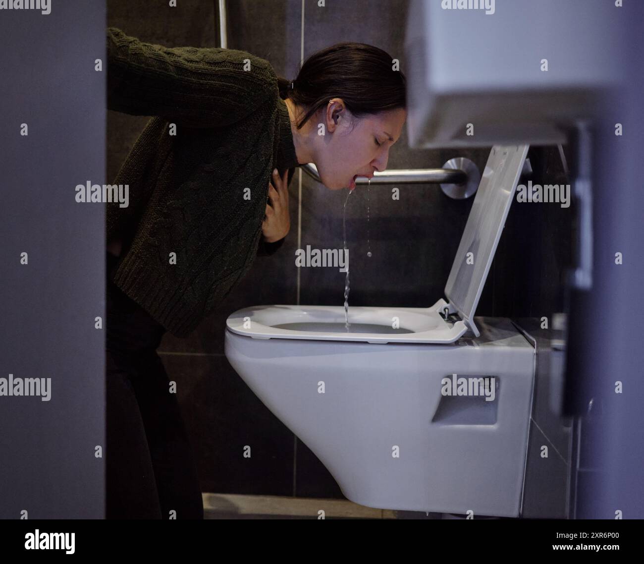 Bathroom, vomit and woman with pain, floor and symptoms of food ...