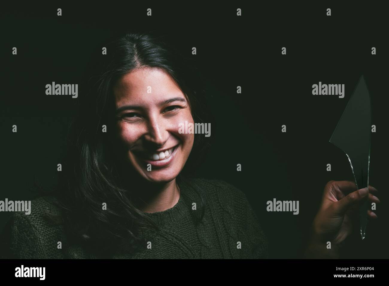 Portrait, broken mirror and woman with smile, glass and person on dark ...