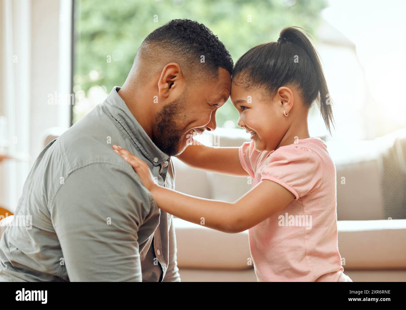 Forehead touch, father and child in portrait, connection and bonding as ...