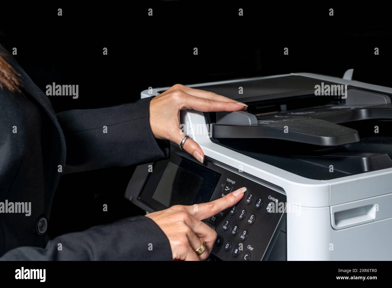 executive woman taking a photocopy - photocopier Stock Photo - Alamy