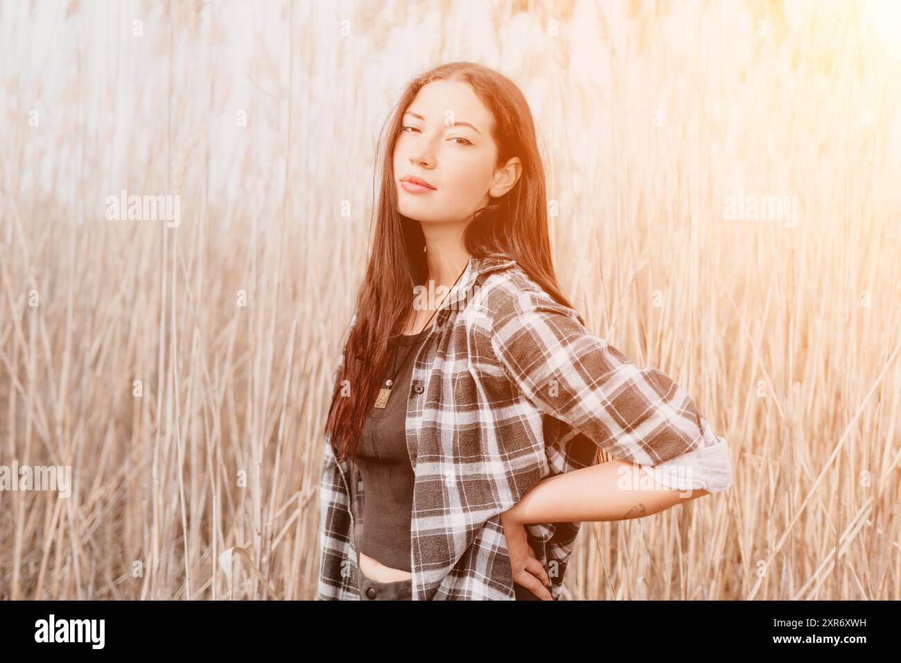 Portrait of a Confident Woman in a Field of Reeds Stock Photo - Alamy