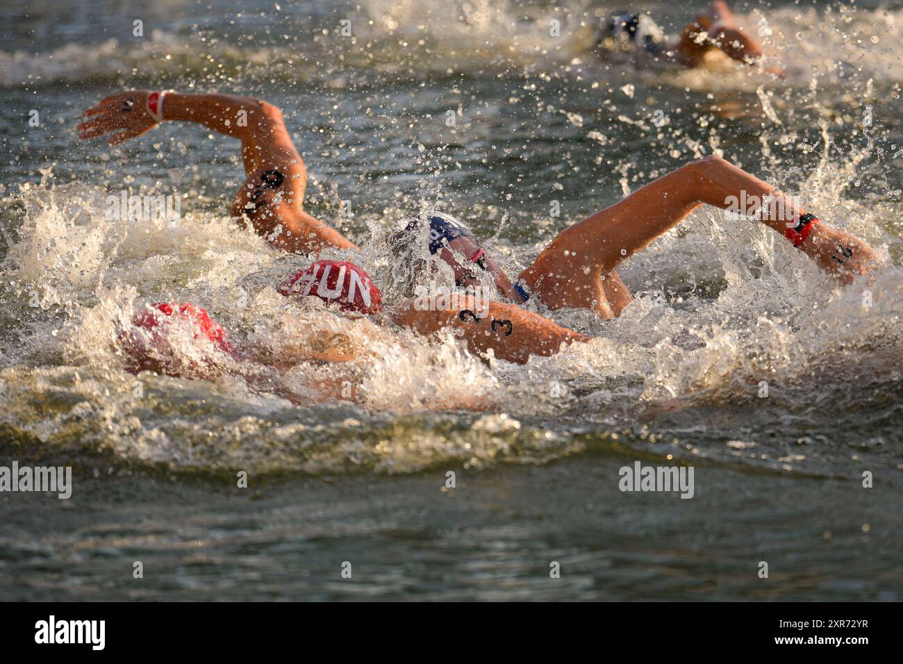 Athletes compete during the marathon swimming men's 10km competition at ...