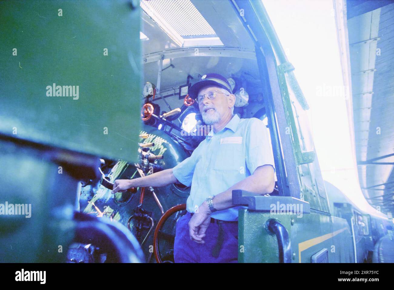 Engineer and stoker on steam locomotive Bonne from Hoogovens Stoom in ...