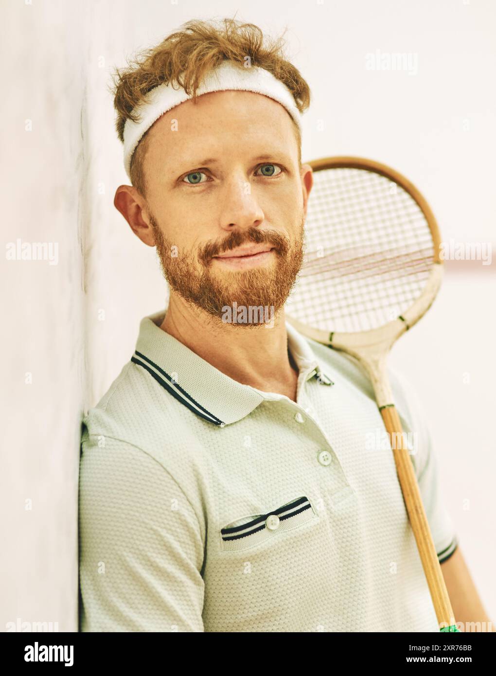 Exercise, portrait and racket with squash player man on wall background ...