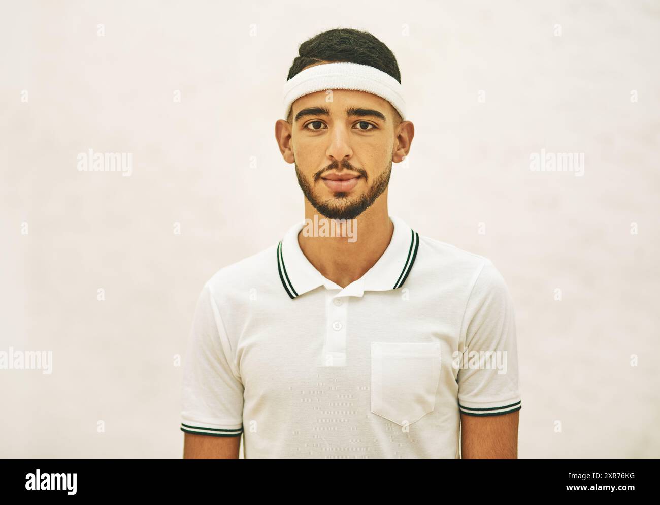 Exercise, portrait and sports with squash player man on wall background ...