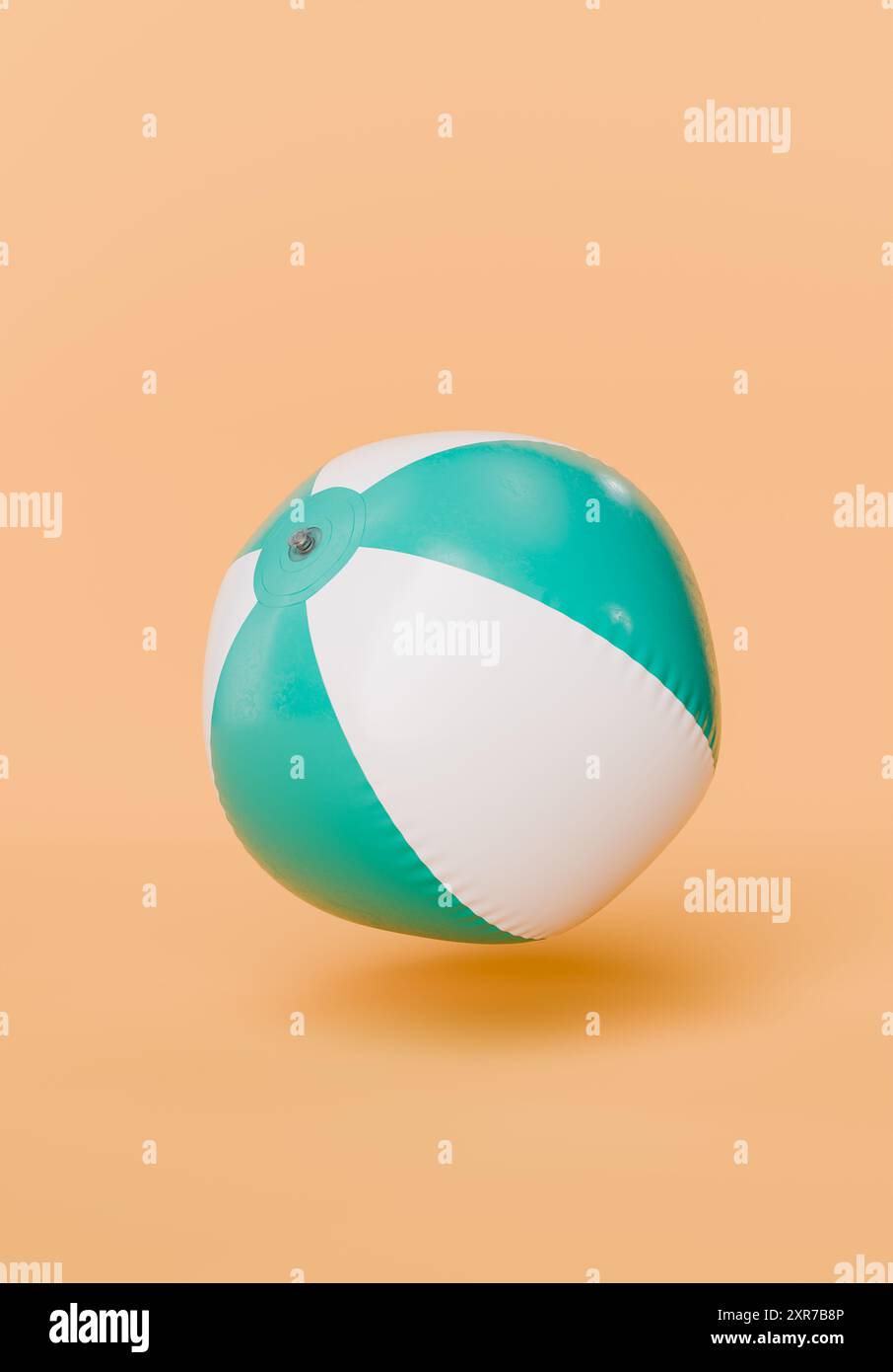 Classic white and turquoise beach ball with a visible inflation valve ...