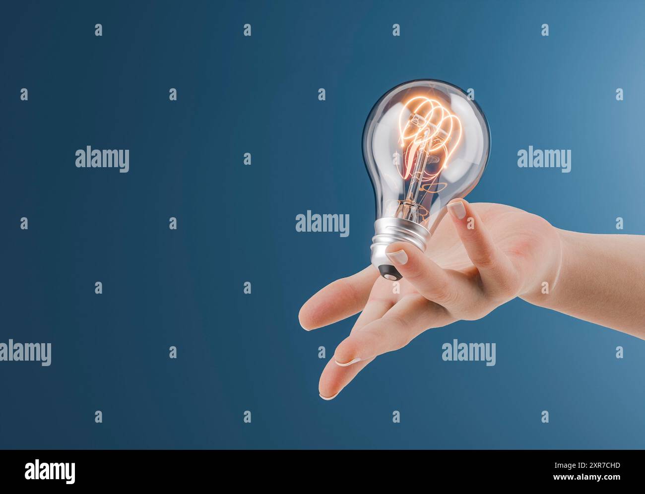 Hand showing a glowing light bulb on a blue background. Concept of ...