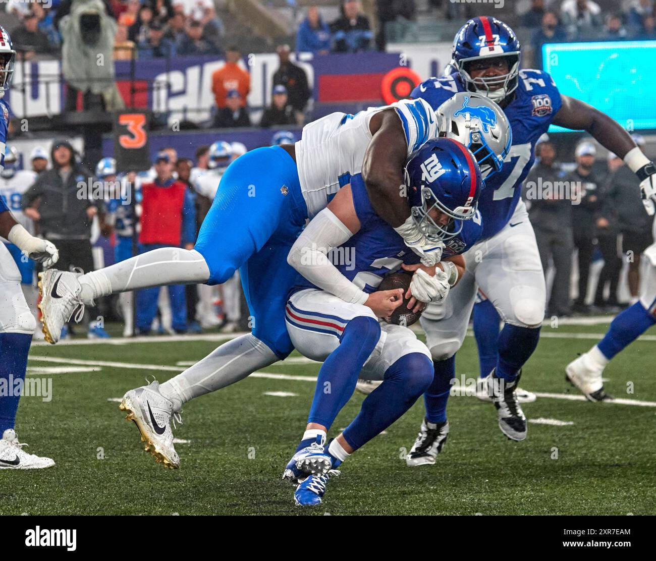Detroit Lions defensive end Isaac Ukwu (45) tackles New York Giants ...
