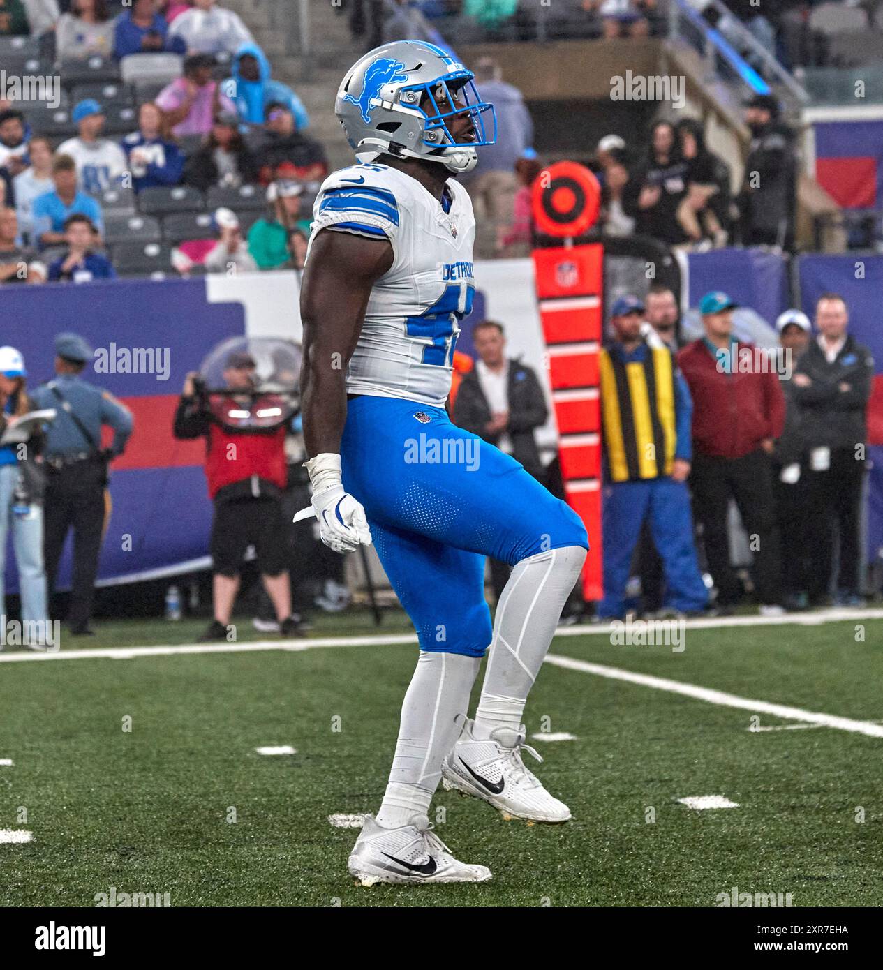 Detroit Lions defensive end Isaac Ukwu (45) reacts after tackling New ...