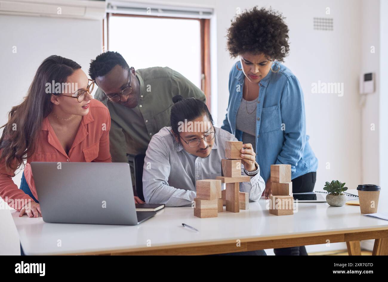 Office, business people and concentrate on building blocks with ...