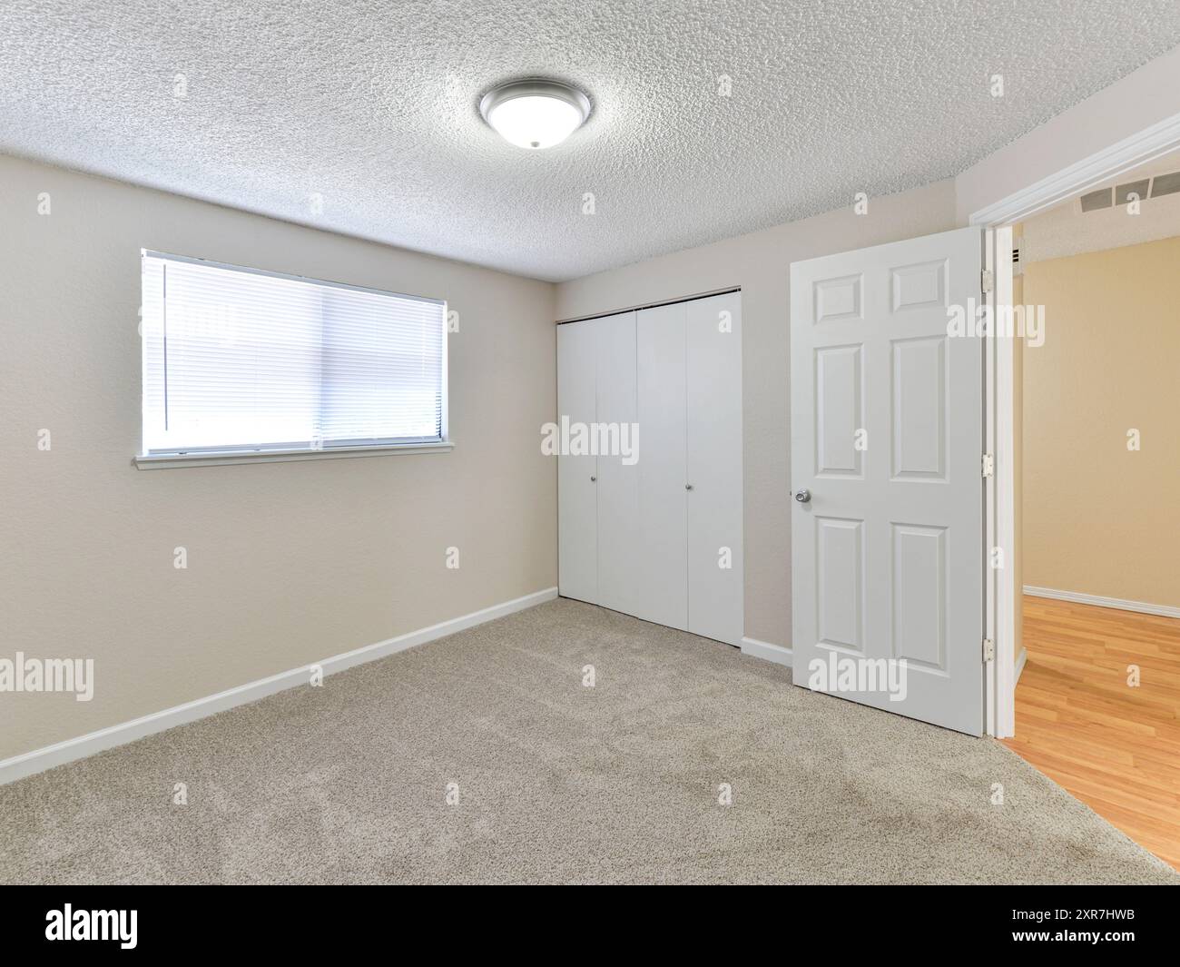 Modern residential empty bedroom interior Stock Photo - Alamy