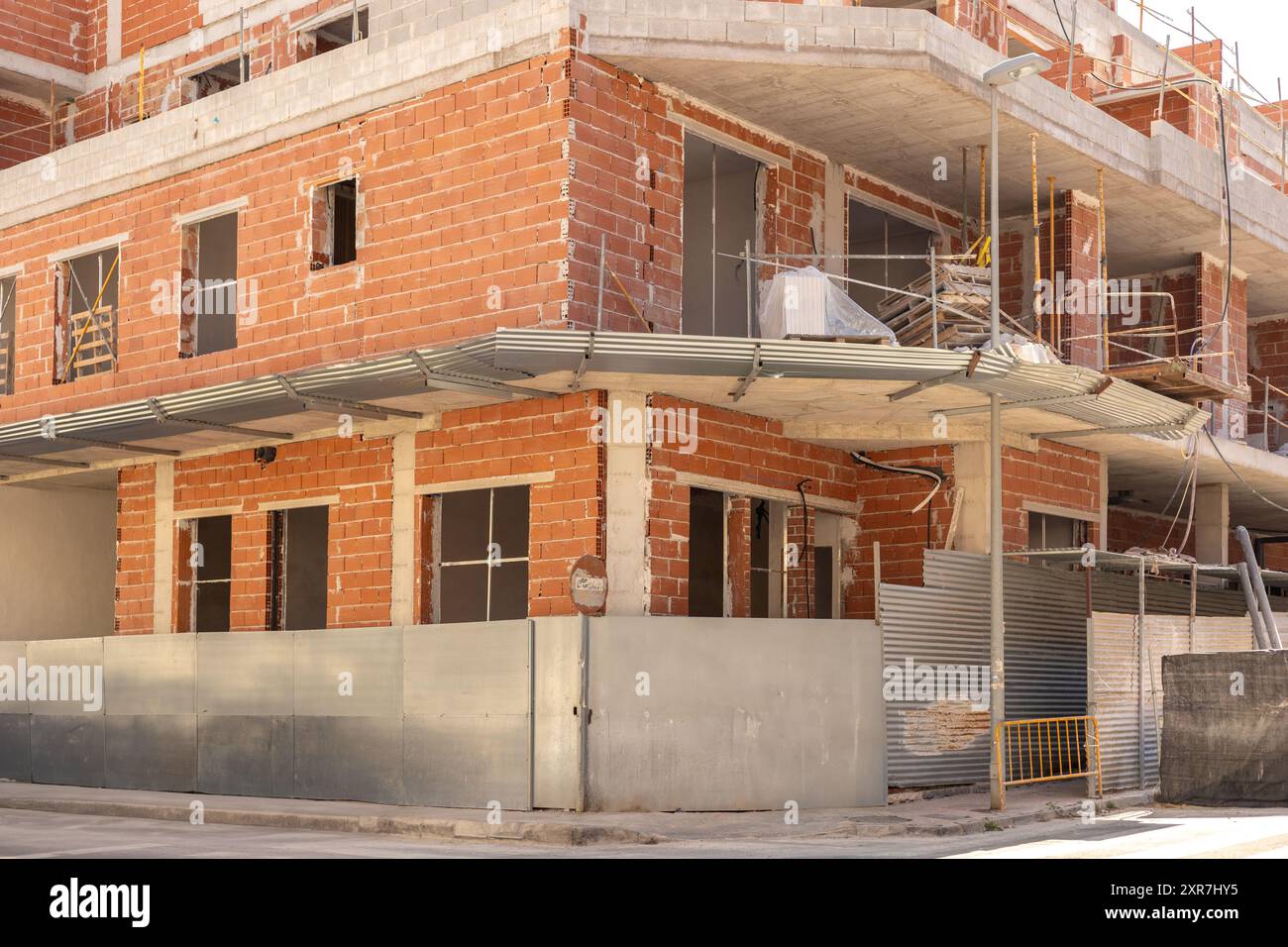 Dynamic process of urban development, showing a partially constructed ...