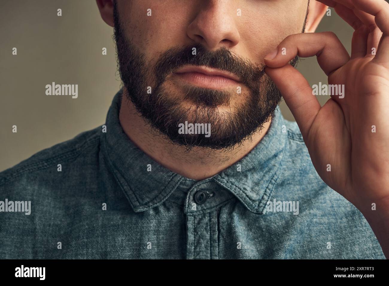 Man, face and twirl mustache in studio for grooming, haircare and ...