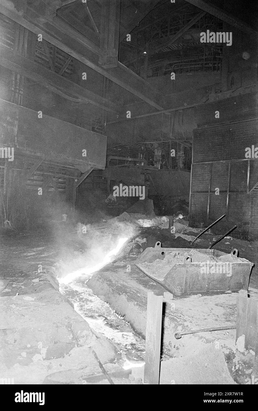 Blast furnace activities; unloading ships, forge and trains Stock Photo ...