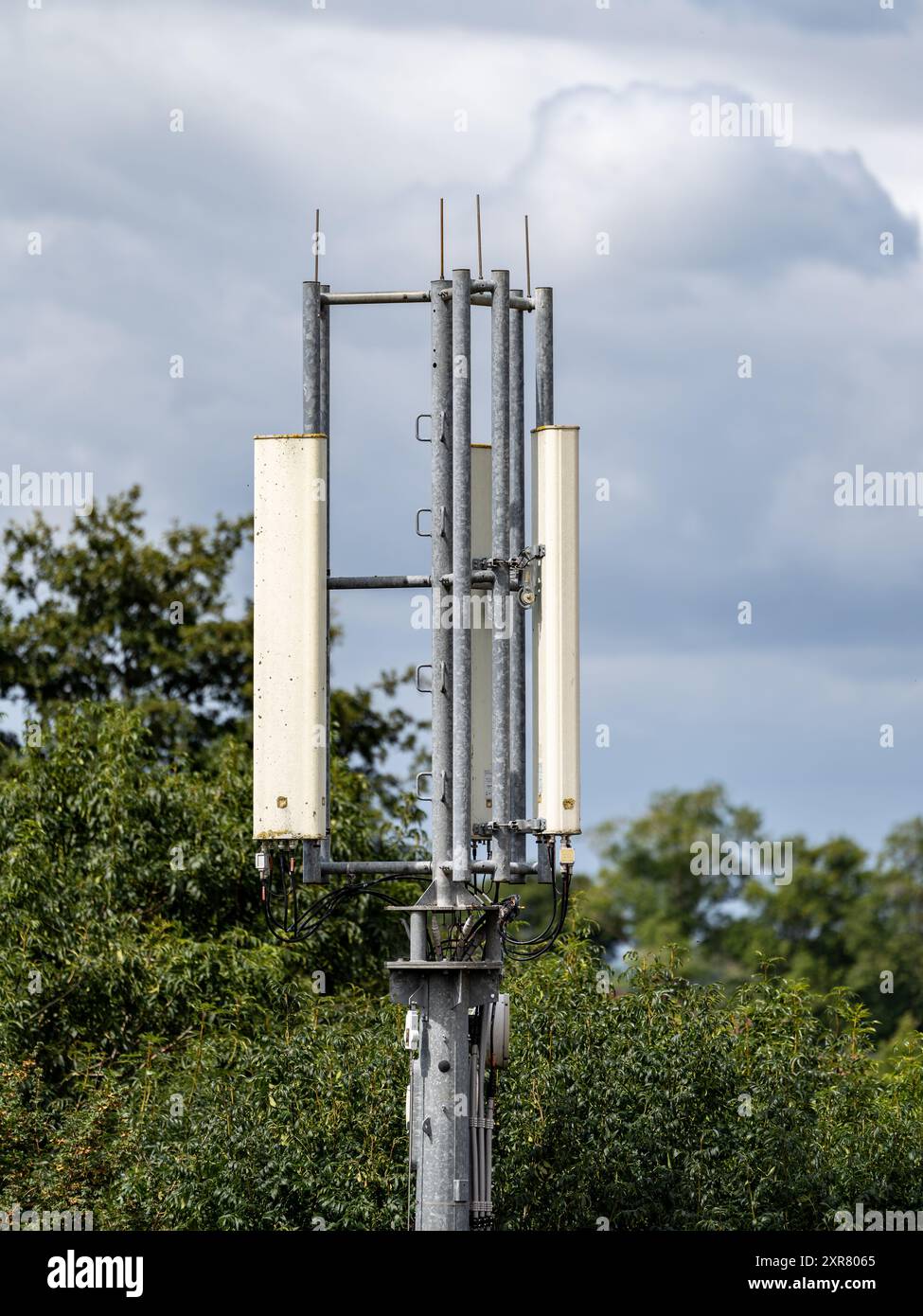 Telecommunication tower with multiple antennas is standing tall, ensuring seamless connectivity ...