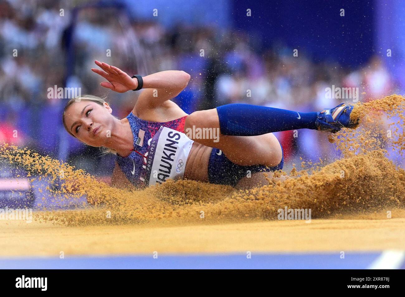 Chari Hawkins, of the United States, competes in the women's heptathlon ...