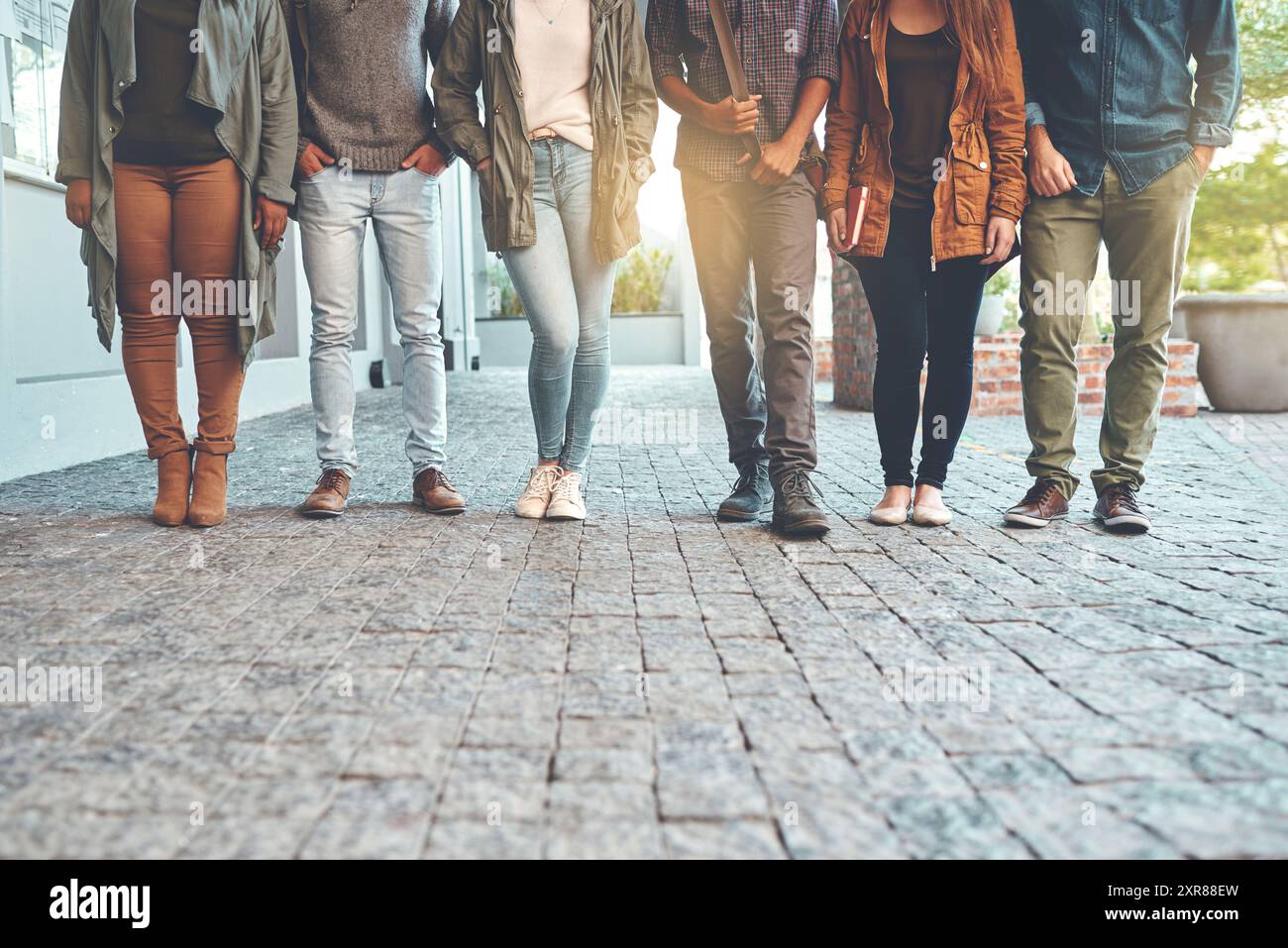 Feet, people and group at university outdoor for walking to school ...
