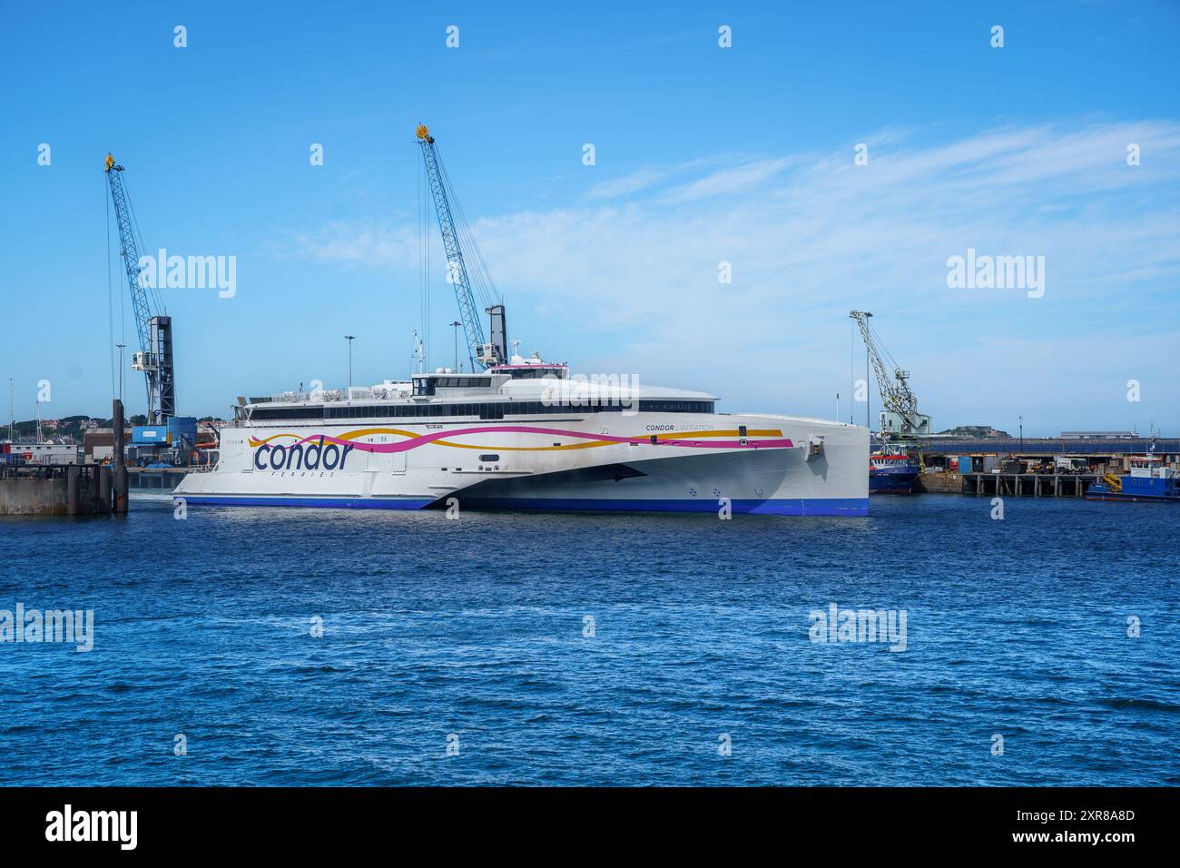 Condor ferry the Liberation leaving St Peter port on route to Poole Harbour UK Stock Photo - Alamy