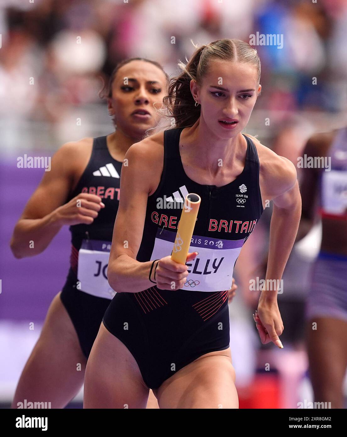 Great Britain's Yemi Mary John passes the baton to team-mate Hannah ...