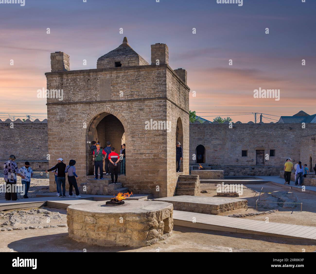 Baku, Azerbaijan - May 9, 2024: Tourists gather in the courtyard of the ...