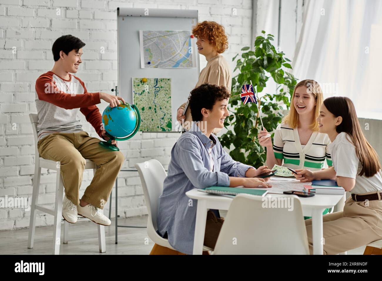 Teenagers participate in a lively discussion during a Model UN ...