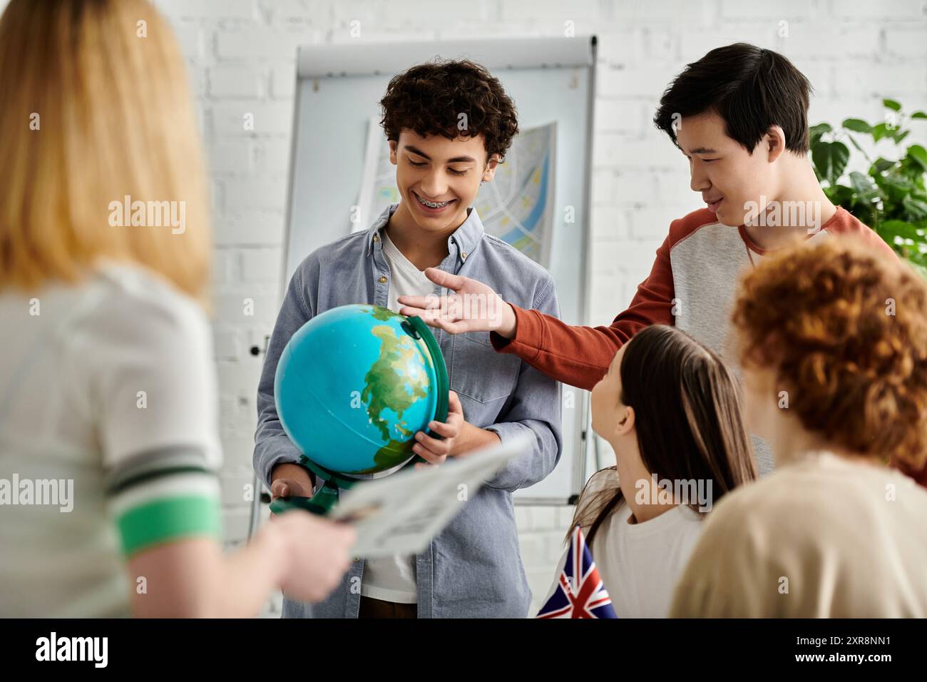 Gather around map hi-res stock photography and images - Alamy