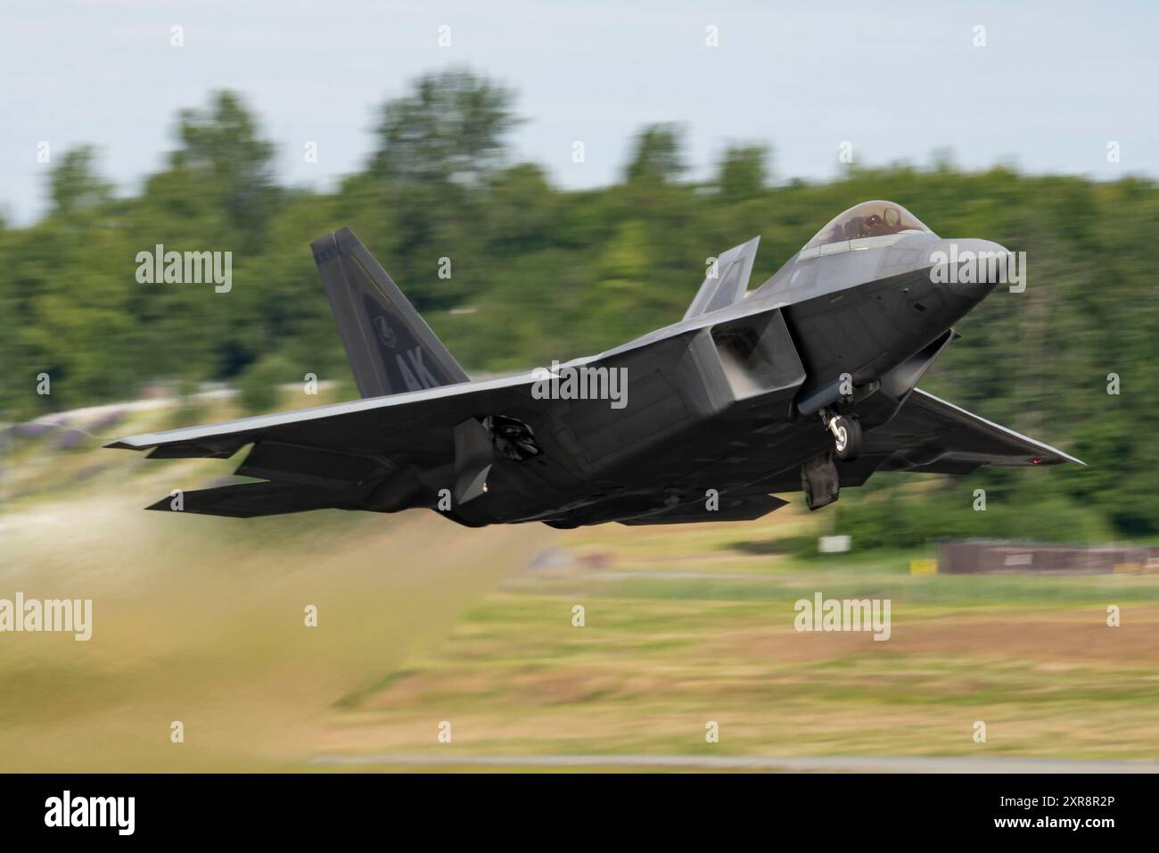 An F-22 Raptor assigned to the 3rd Wing takes off at Joint Base ...