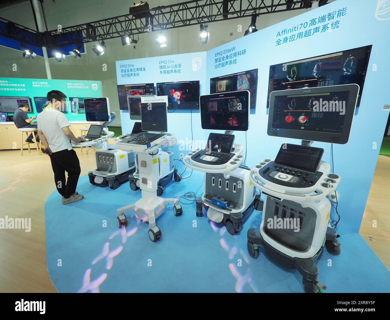 BEIJING, CHINA - AUGUST 9, 2024 - Visitors visit ultrasound system ...