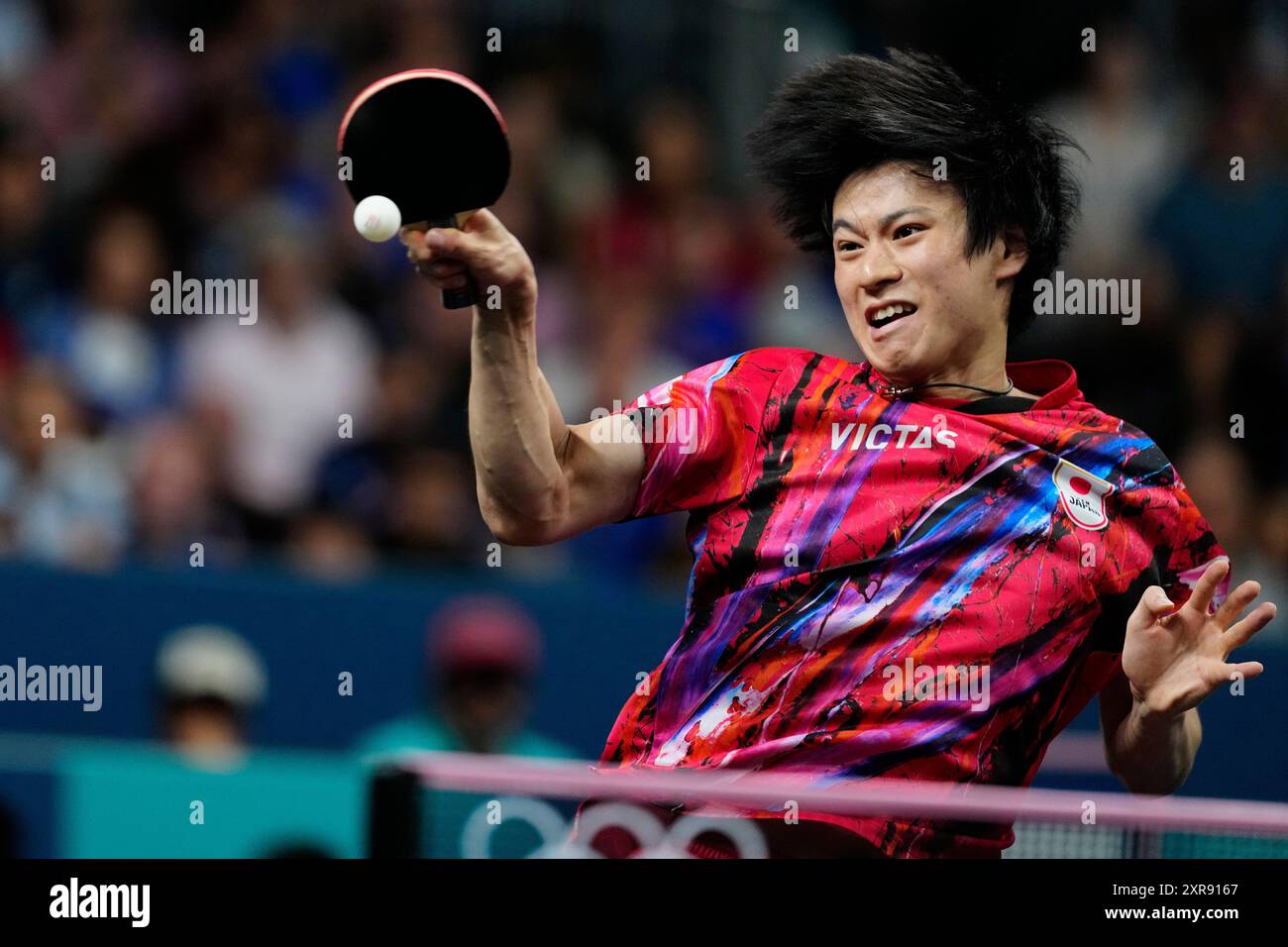 Japan's Shunsuke Togami plays against France's Alexis Lebrun during the ...