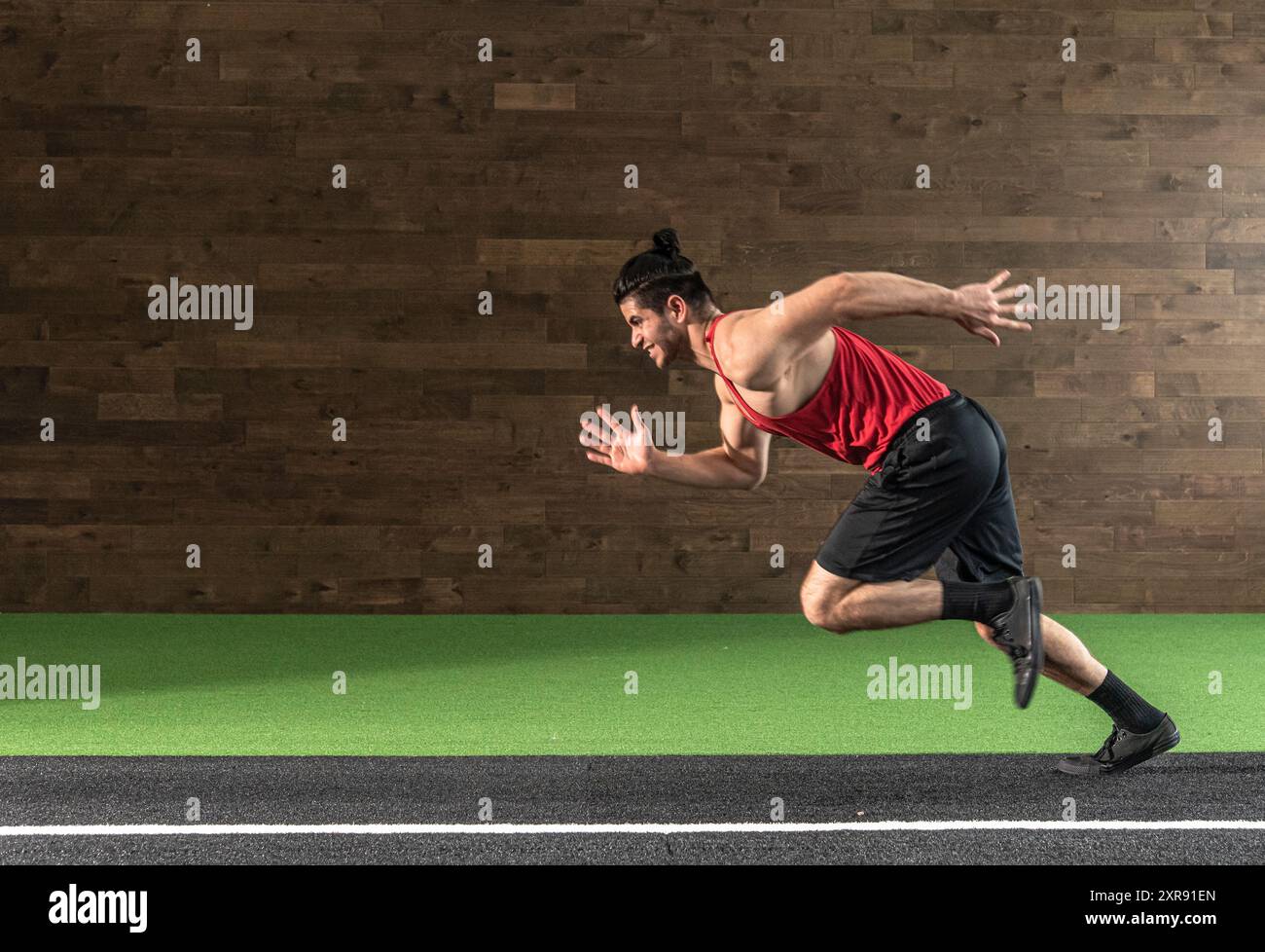 Indoor sprints with a Hispanic male Stock Photo - Alamy