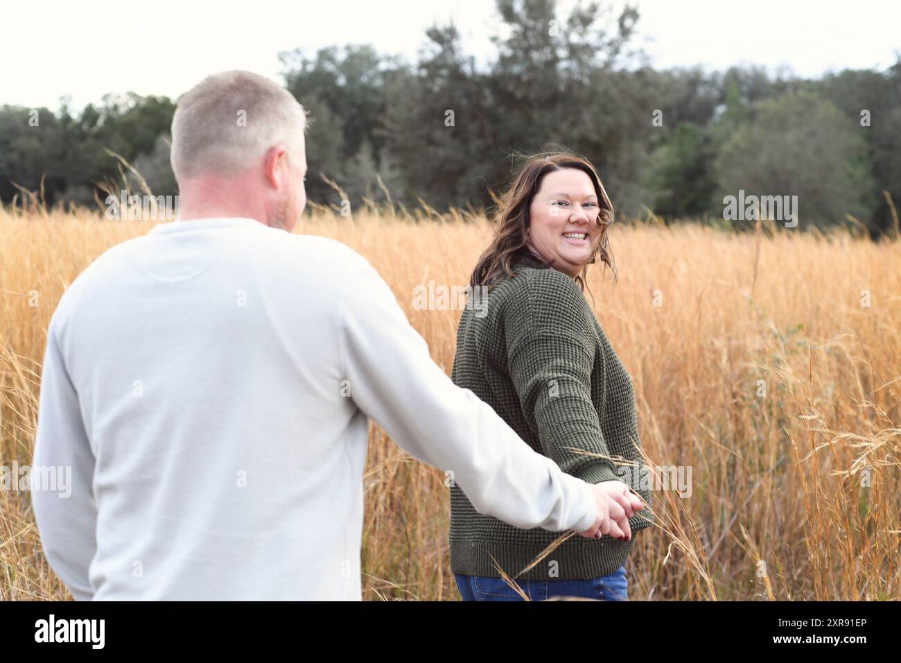 Man walking field tall grass hi-res stock photography and images - Alamy