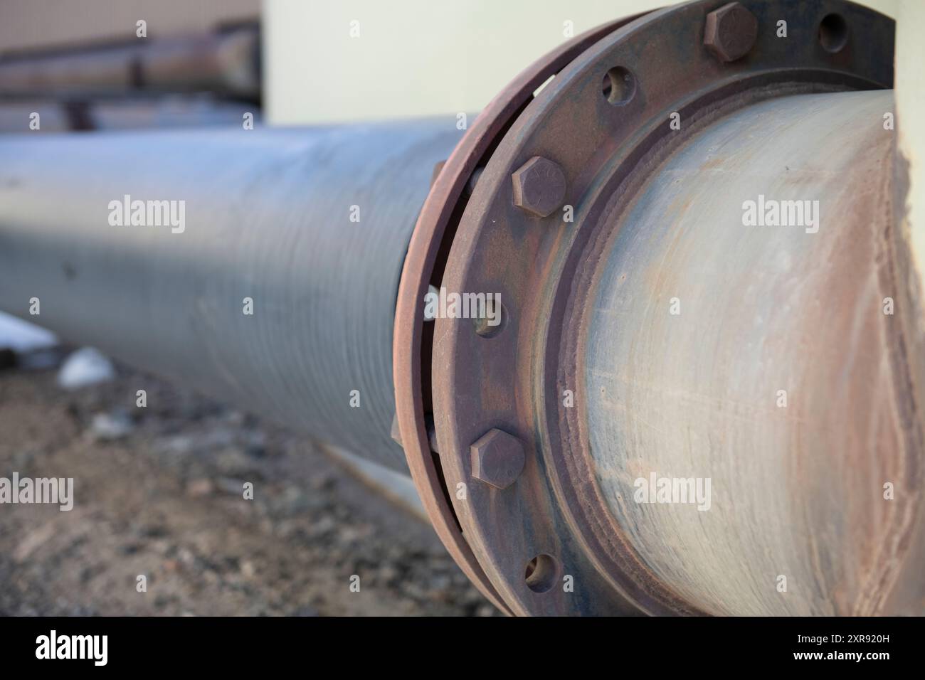 Large industrial horizontal water pipe with rusted fittings Stock Photo ...