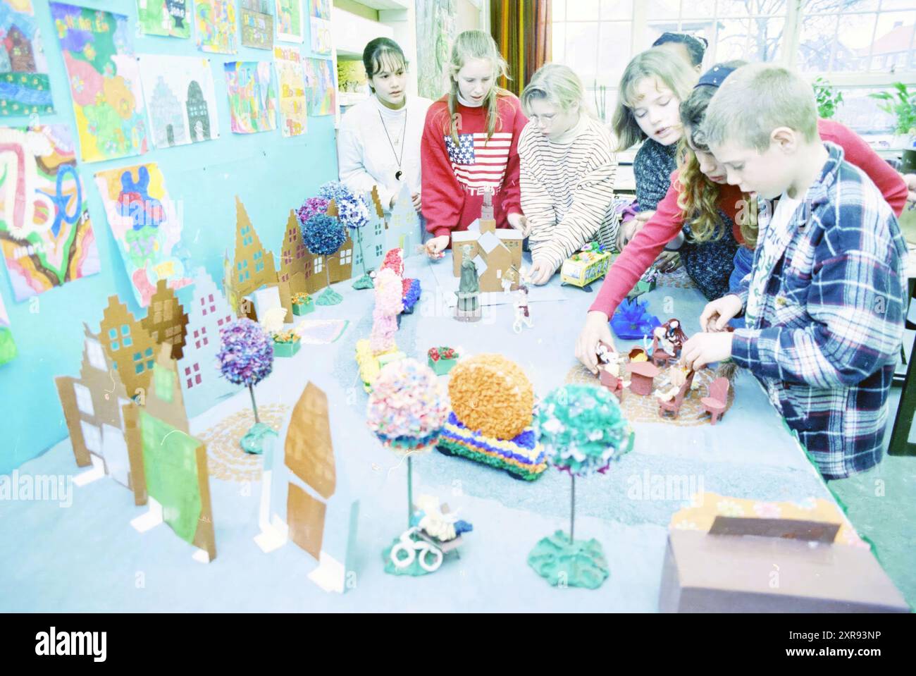 Children make 'model' (facades, street, park, etc.), Queen Emma School ...
